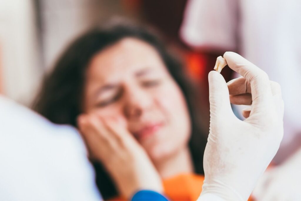 Implants Bridges Dentures Options After Tooth Extraction